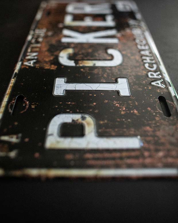 Rusty Black Picker License Plate | Antique Archaeology